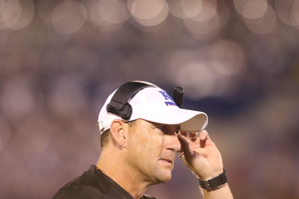 KU reaches $2.55 million settlement with former football coach David ...